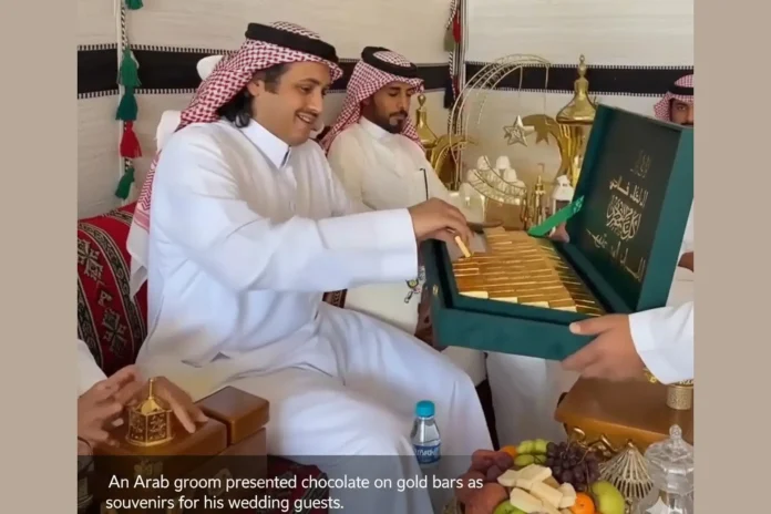 Arab Groom Gifts Guests Chocolate on Gold Bars: Unique Wedding ...